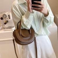 China Solid Color Cowhide Leather Saddle Bag Small Portable Crossbody Zipper Closure 20cm for sale