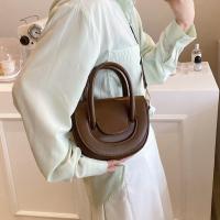 China Solid Color Cowhide Leather Saddle Bag Small Portable Crossbody Zipper Closure 20cm for sale