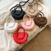 China Solid Color Cowhide Leather Saddle Bag Small Portable Crossbody Zipper Closure 20cm for sale