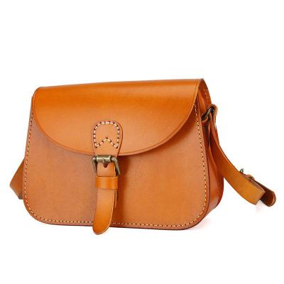 China Handcrafted Vegetable Tanned Cowhide Saddle Bag for Women Top Layer Leather Daily Use for sale