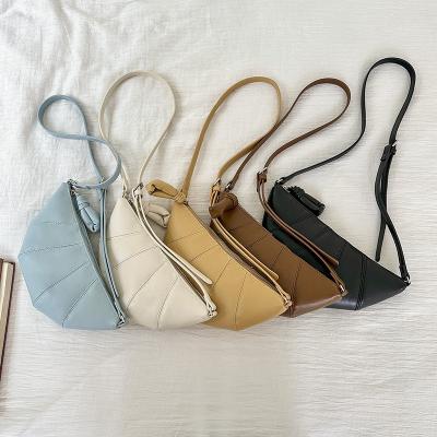 China Korean PU Leather Moon Bag Cute Dumpling Shoulder Messenger Bag for Women 2025 for sale