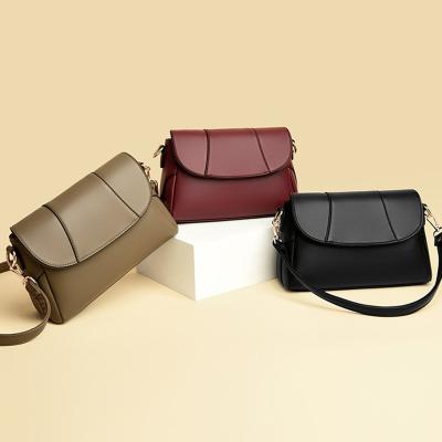 China Custom Logo Vegan PU Leather Lady Purse with Zipper Closure Fashion Handbag for Daily Use for sale