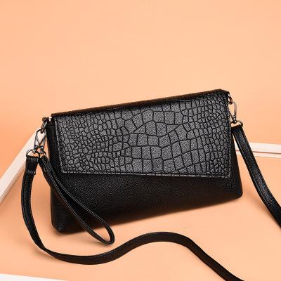 China Genuine Leather Crocodile Pattern Envelope Clutch Bag for Women Fashion Handbag 2023 for sale