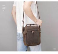 China Retro Brown Cowhide Leather Messenger Bag for Men Durable 15.6 Inch Laptop Shoulder Bag for sale
