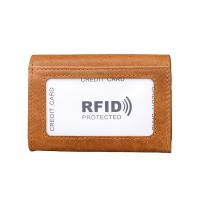 China Custom Logo RFID Blocking Short Bifold Zipper Wallet for Men Cow Leather 10.5cm x 7.5cm for sale