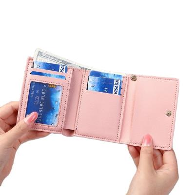 China Mini PU Leather Short Wallet for Women Fashion Creative Small Coin Purse 11cm for sale