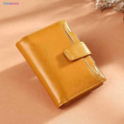 China Mini Genuine Leather Coin Purse Vintage Oil Wax Wallet for Women 10cm x 8cm for sale