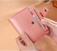 China Mini Genuine Leather Coin Purse Vintage Oil Wax Wallet for Women 10cm x 8cm for sale