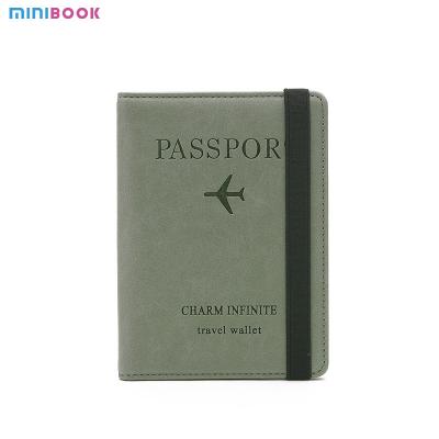 China Customized RFID Blocking Minibook Passport Holder Travel Wallet 14.8x11cm PU Leather for sale