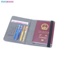 China Customized RFID Blocking Minibook Passport Holder Travel Wallet 14.8x11cm PU Leather for sale