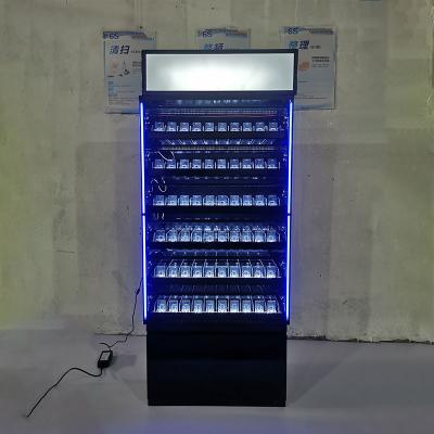 China Customized Wall Metal Cigarette Display Stand With Top Light Box And Large Storage Cabinet for sale