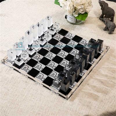 China Classic White and Black Chess Pieces Decor Lucite Acrylic Chess Board Set for sale
