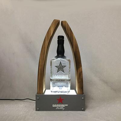 China Single Mutiple Bottles Customized Display Stand Acrylic Wood Led Bottle Glorifier for sale