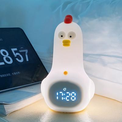 China Children's Sleep Trainer Silicone Night Light Kids Smart Alarm Clock For Baby Room for sale