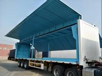 China Customizable Color 40 Tons Wingspan Van Semi Trailer with 12 Wheels and 40 Feet Length for sale