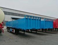China 40-100 Ton 3 Axles Dropside Sidewall Semi Trailer for Heavy Duty Cargo Transportation for sale