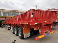 China Mechanical Suspension 45 cubic meter side dump trailer bulk cargo transport trailer for sale