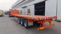 China Main Beam Height 0.5m 3 Axle Flatbed Semi Trailer for 20FT 40FT Container Transportation for sale