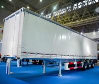 China 60 Tons Tare Weight Semi-Trailer for Truck 3 Axle Aluminium Floor PVC Side Curtain for sale