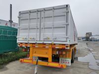 China Wosheng Side Dump Semi-Trailer with 90 w mm*13/16 thickness mm Leaf Spring and Tri-Axle for sale