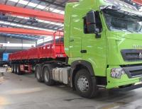 China Wosheng Tri-Axle Side Dump Trailer with Hydraulic Lift and 13000*2550*2900mm Dimensions for sale