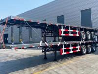 China Wosheng 's Max Payload 30000 kg 3 Axle 4 Axle Steel Container Flat Bed Semi Trailer for sale