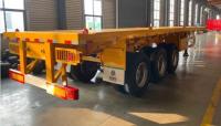 China Wosheng 's Max Payload 30000 kg 3 Axle 4 Axle Steel Container Flat Bed Semi Trailer for sale