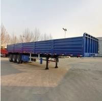 China 12.00R22.5 Tri-axle Fence Semi Truck Transport Bulk Cargo Trailer Side Dump Semi Trailer for sale