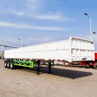 China 3 Axles Drop Side Cargo Side Wall Semi Trailer With Mechanical Suspension For 50 Tons for sale