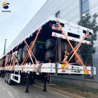 China Container Flatbed Semi Trailer with Leaf Spring 90x13/16x10 Layers and 30-70t Capacity for sale