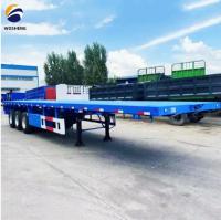 China Container Flatbed Semi Trailer with Leaf Spring 90x13/16x10 Layers and 30-70t Capacity for sale