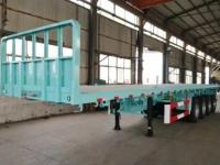 China Mechanical Suspension 4 Axle Flatbed Semi Trailer for 20FT 40FT Container Transportation for sale