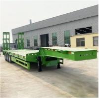 China Customized 12R22.5 Tires 3/4 Axle Low Bed Semi Trailer for Heavy Duty Transfer Equipment for sale