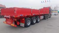 China 13/16 Ton Axle Side Semi Tipping Trucks for Bulk Cargo Steel Material from Professional for sale