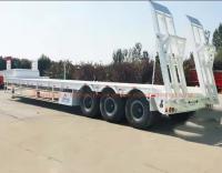 China Low Bed Container Chassis Loader Lowboy Semi Trailer for Heavy Duty Cargo Transportation for sale
