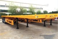 China 12400x2610x1550mm 7 tons Tare Weight 50 tons Payload 20/40ft Flatbed Semi Trailer for sale
