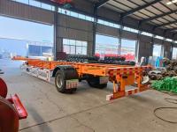 China 2.00 or 3.5 Inch Bolt in King Pin 3 Axle Skeleton Semi Trailer for Container Transport for sale