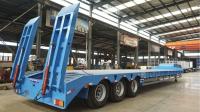 China 4 Axle Semi-Trailer For Heavy Cargo Transportation With Q345B / T700 Steel Main Beam for sale