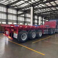 China 3 Axle Flatbed Semi Trailer for Transporting 20ft 40ft Container and Heavy-Duty Cargo for sale