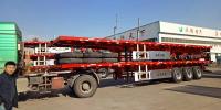 China 3 Axle Flatbed Semi Trailer for Transporting 20ft 40ft Container and Heavy-Duty Cargo for sale