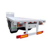 China 12400*2610*1550mm Semi Trailer 3 Axle 40 Ton Low Flatbed Trailer for Bulk Cargo Hauling for sale