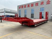 China Top Selling 3 Axles Low Bed Container Chassis Loader Semi Trailer for Heavy Equipment for sale