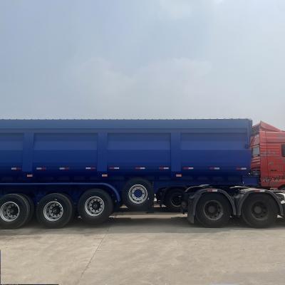 China Highly Durable Dump Truck with 3/4Axle Rear Hydraulic Lifting and Dump Semi-Trailer for sale