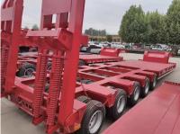 China Customizable 16-Wheel 4-Axles Low Bed Trailer in Oman 13-18m with Max Payload of 30TON for sale