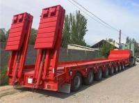 China Customizable 16-Wheel 4-Axles Low Bed Trailer in Oman 13-18m with Max Payload of 30TON for sale