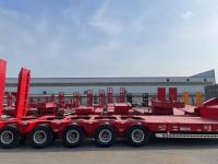 China Customizable 16-Wheel 4-Axles Low Bed Trailer in Oman 13-18m with Max Payload of 30TON for sale