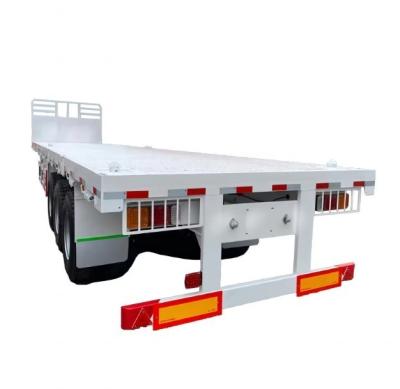 China 90T Max Payload Steel 20FT 40FT Container Flatbed Semi-Trailer with 12r22.5 Tyre for sale
