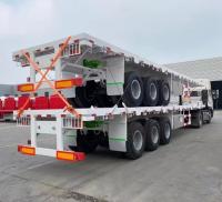 China 90T Max Payload Steel 20FT 40FT Container Flatbed Semi-Trailer with 12r22.5 Tyre for sale