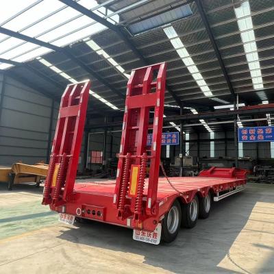 China Professional 's Heavy Duty Lowbed Semi Trailer With 3 Axle 4 Axle Max Payload 30000 kg for sale