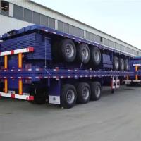 China 3 Axle 12R22.5 Tyre Steel Material Flatbed Semi Trailer with Max Payload of 20T-80T for sale